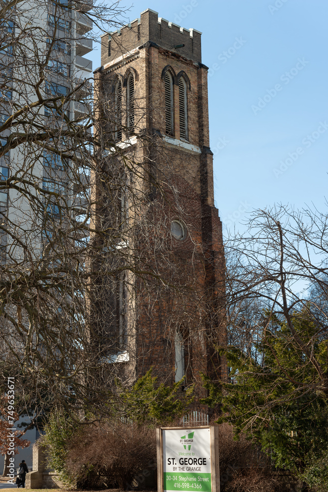 sign and old tower of St. George by the Grange Anglican Church located ...