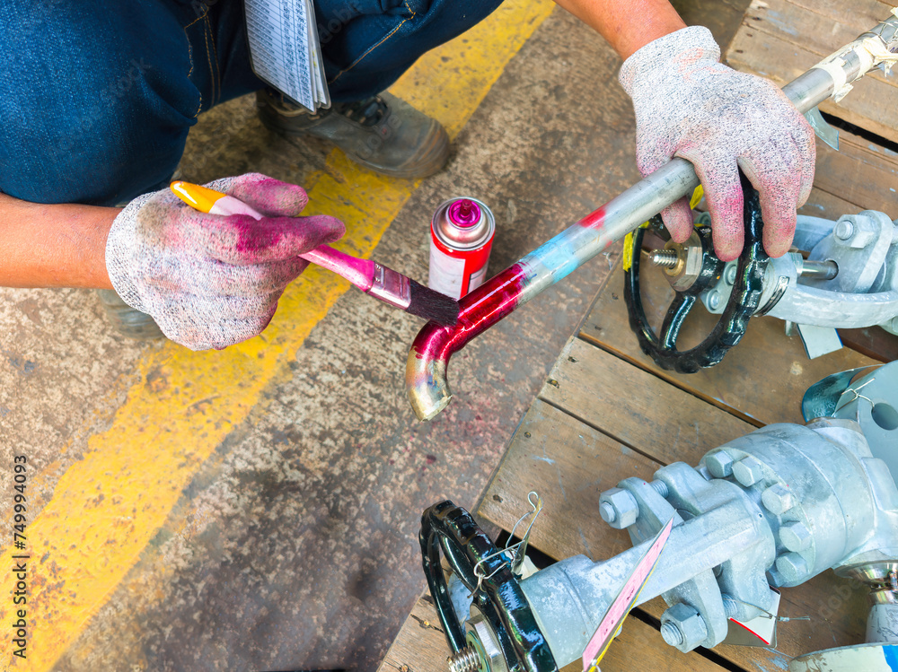 Use a Brush and Apply Liquid Penetrant into the Welding line of ...