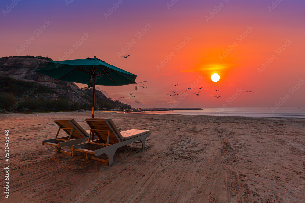 Beaches and sun tables in Thailand,Row of empty sun loungers and orange ...