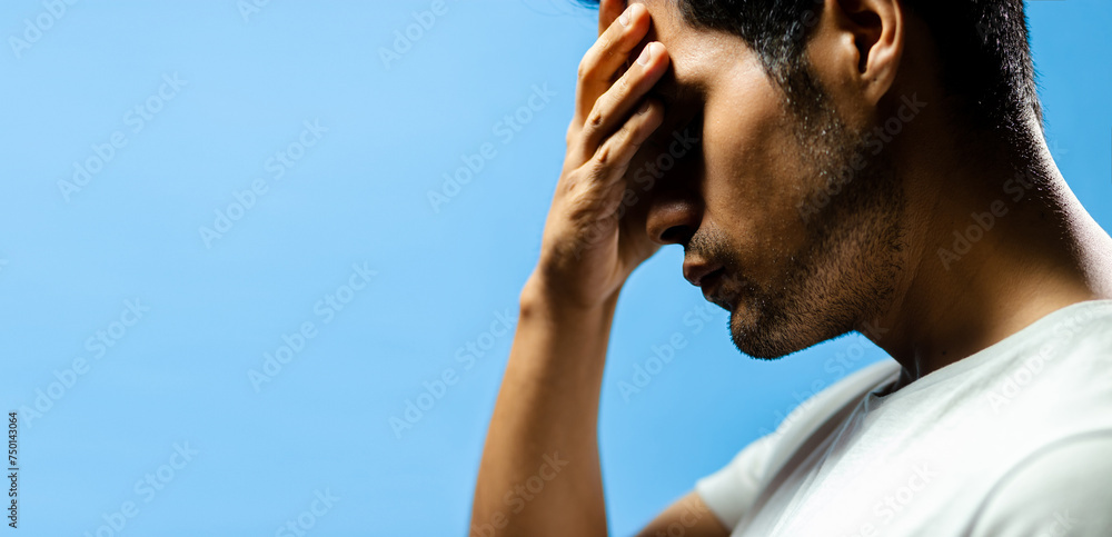 A young person with an expression of pain, sadness, apathy, and stress ...