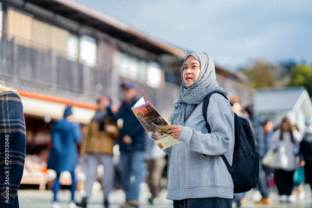 Travel, muslim travel, Asian Muslim female tourists visitor learning ...