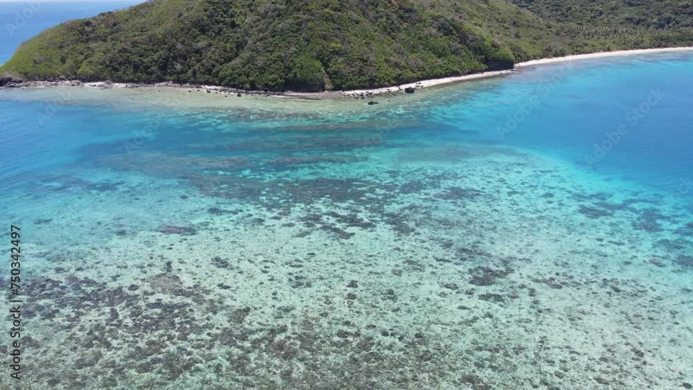 Descending top down aerial of coral reefs: one of the most fascinating ...