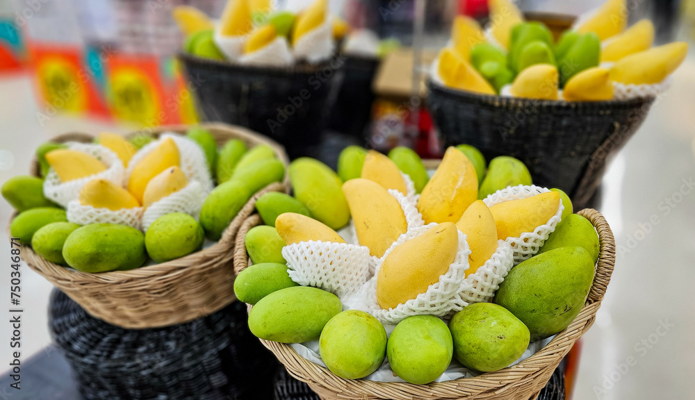 Pile of tropical fruit, Green Mango, Yellow mango (Ripe mango) in ...