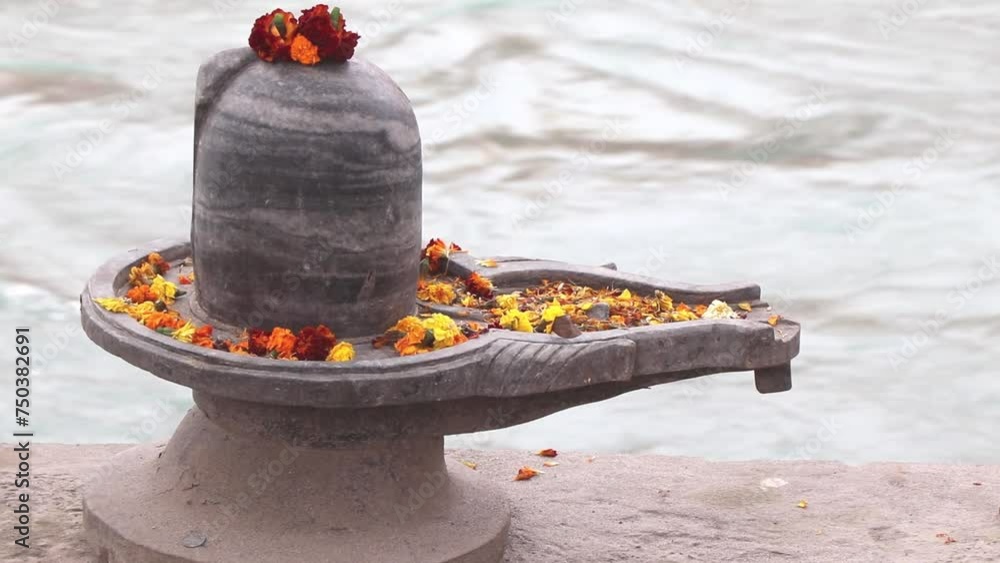 Shiva lingam on the bank of river ganga.In Hinduism, shiva lingam is a ...