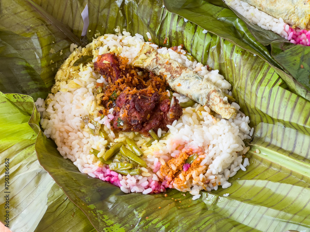 Pothichoru or pothichor Kerala Style Rice chicken beef egg Wrapped ...