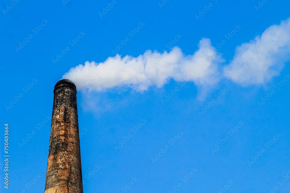 The chimney of brick field emitting heavy smoke with unhealthy carbon ...