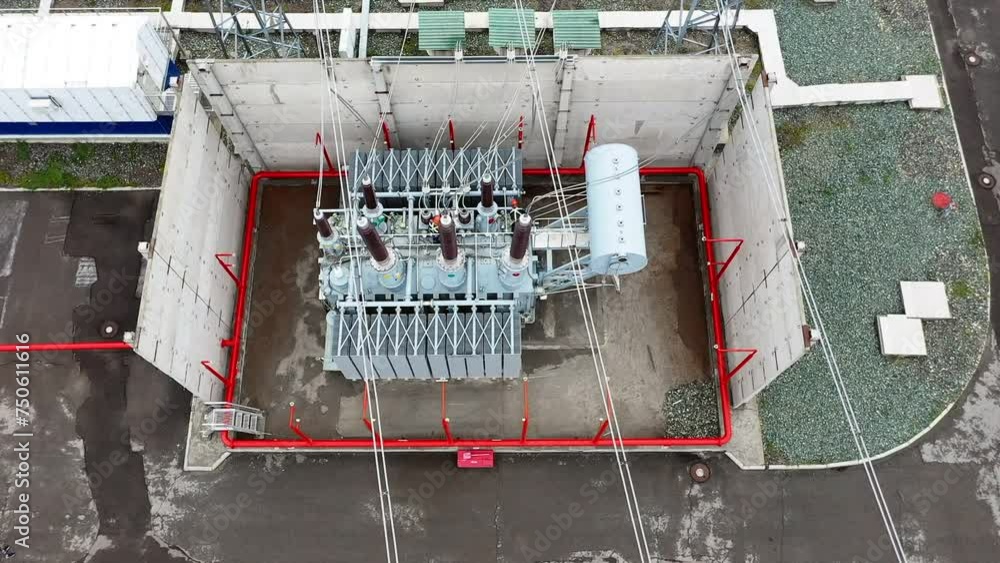 Vidéo Stock Bird's-eye view of a power transmission substation with ...