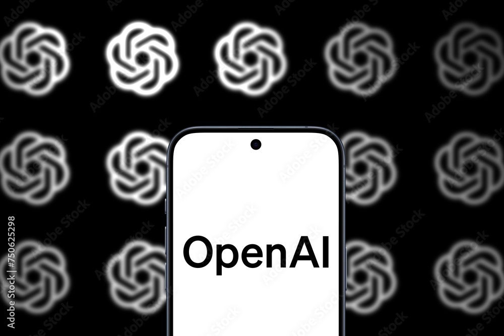 OpenAI lettering is displayed on a modern smartphone, black background ...