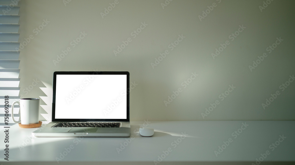Mock up laptop computer with empty screen, on white working desk. Stock ...