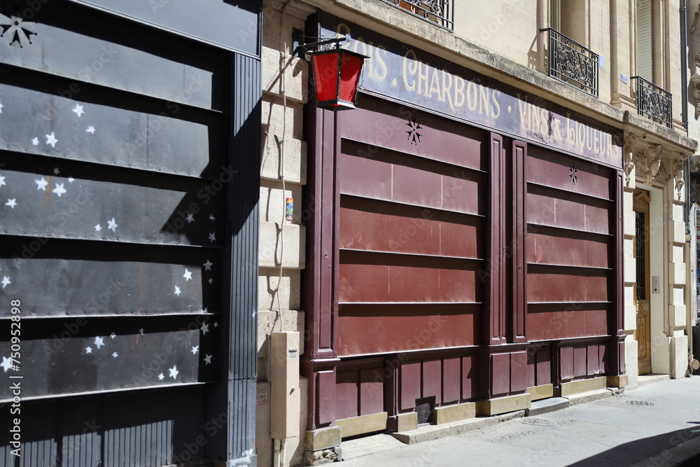 paris france, 08 08 2024 : typical red and grey storefront from Paris ...