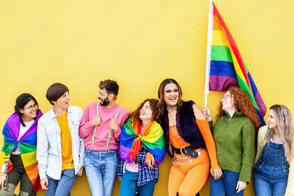 Young group of people leaning on yellow background celebrating together ...