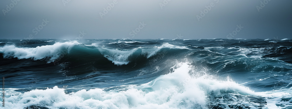Intense scene of a stormy sea with towering waves. Contrast between the ...