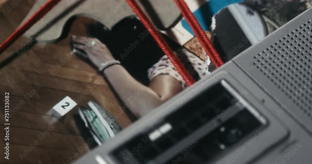 A detective's investigative board revealing crime scene photos and a ...