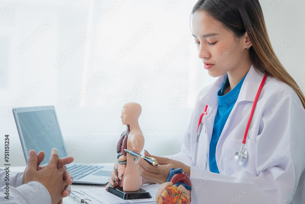 Heart disease. Female doctor gives advice on heart disease treatment. A ...