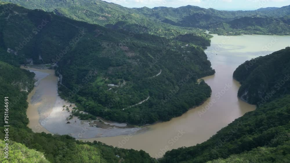 Aerial panoramic view of serpentine river crossing lush landscape ...