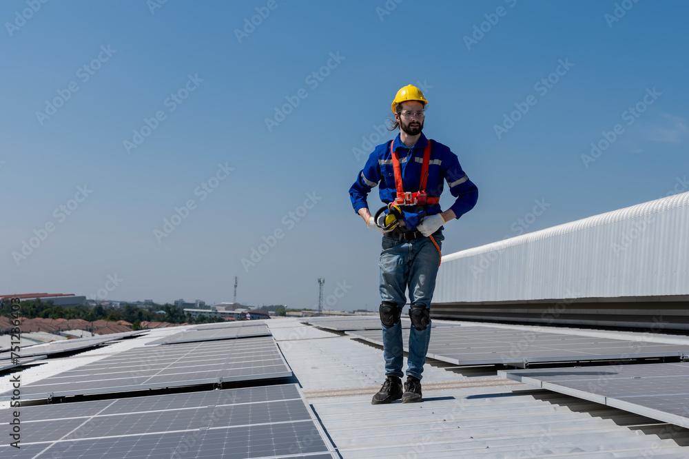 Professional solar roof engineer man standing on factory building roof ...