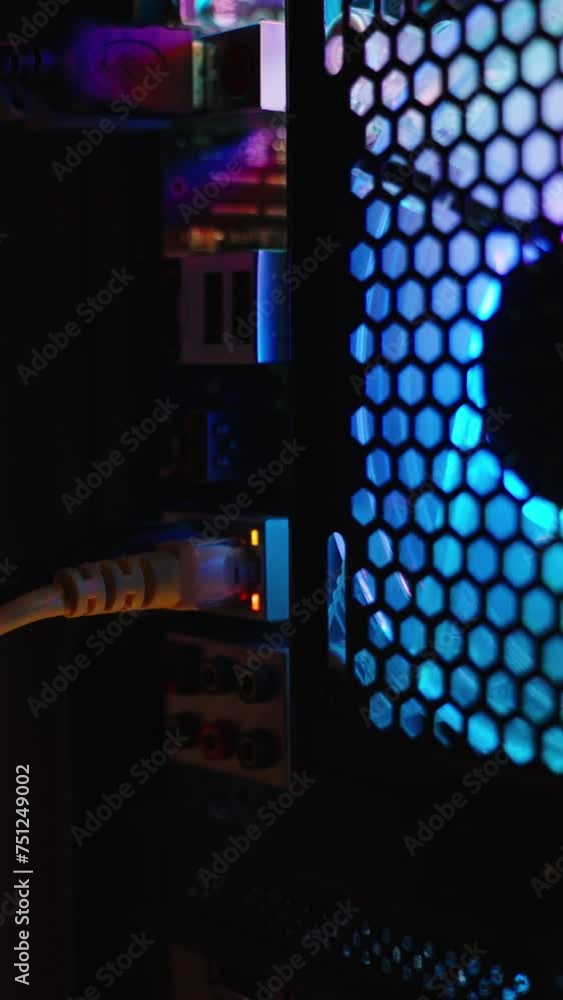 Vertical video. Desktop PC, rear panel with output ports for device connection, USB and Ethernet ...