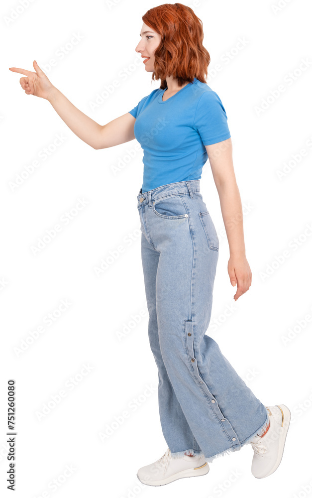 Woman walking and pointing, full length side view young 20s caucasian ...