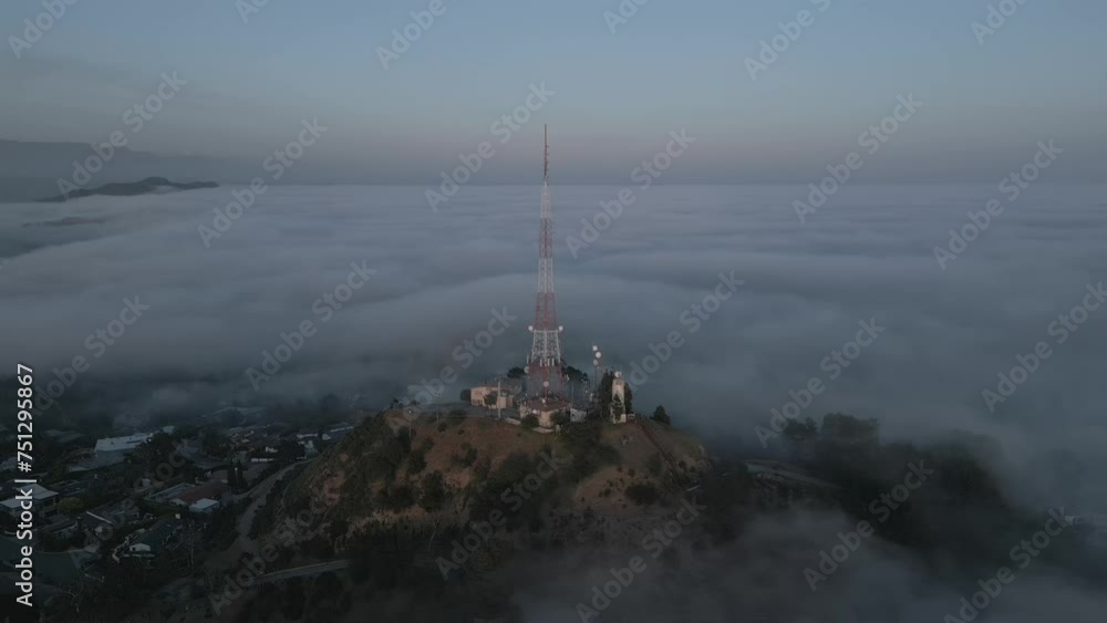 Aerial video of a transmitter tower and Mount Lee and the Hollywood ...