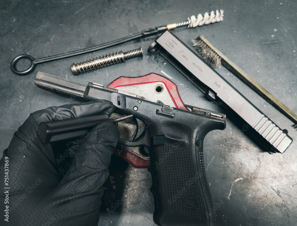 Baltic States, March 5, 2024. Firearm disassembly and cleaning ...