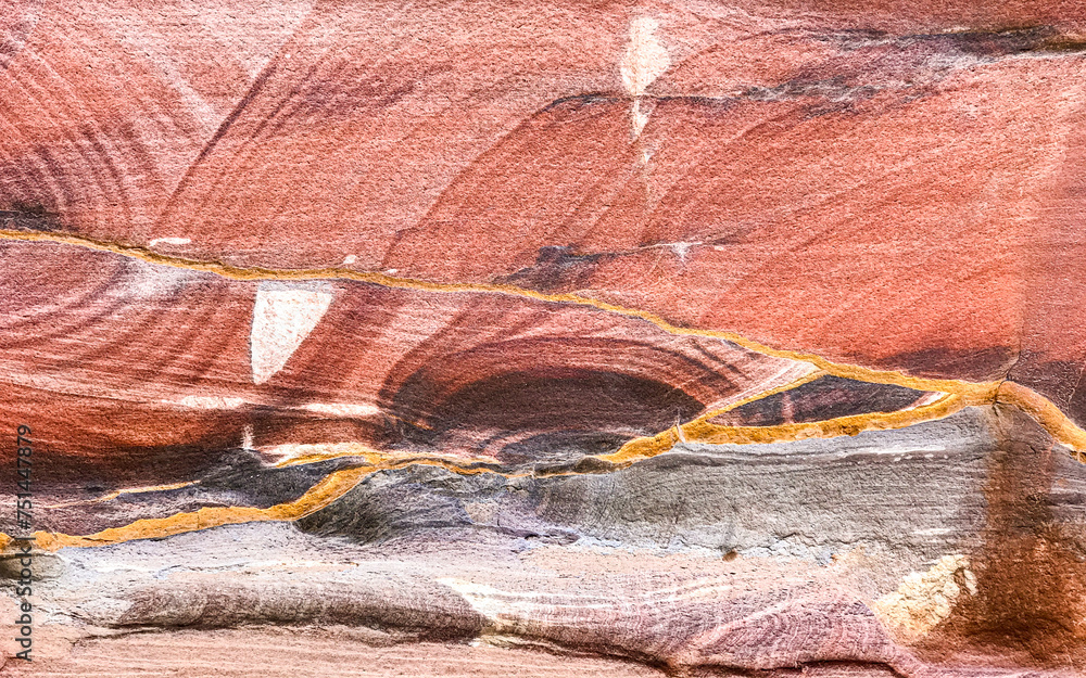 geological lines in the stone of petra. Sandstone texture close up. Red ...