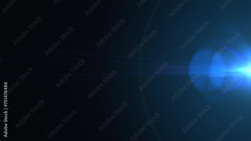 Abstract center blue optical lens flares light shine ray moving from ...