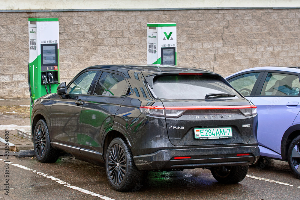Minsk, Belarus. Feb 3.2024. Honda e:NP1 electirc car charge battery on ...