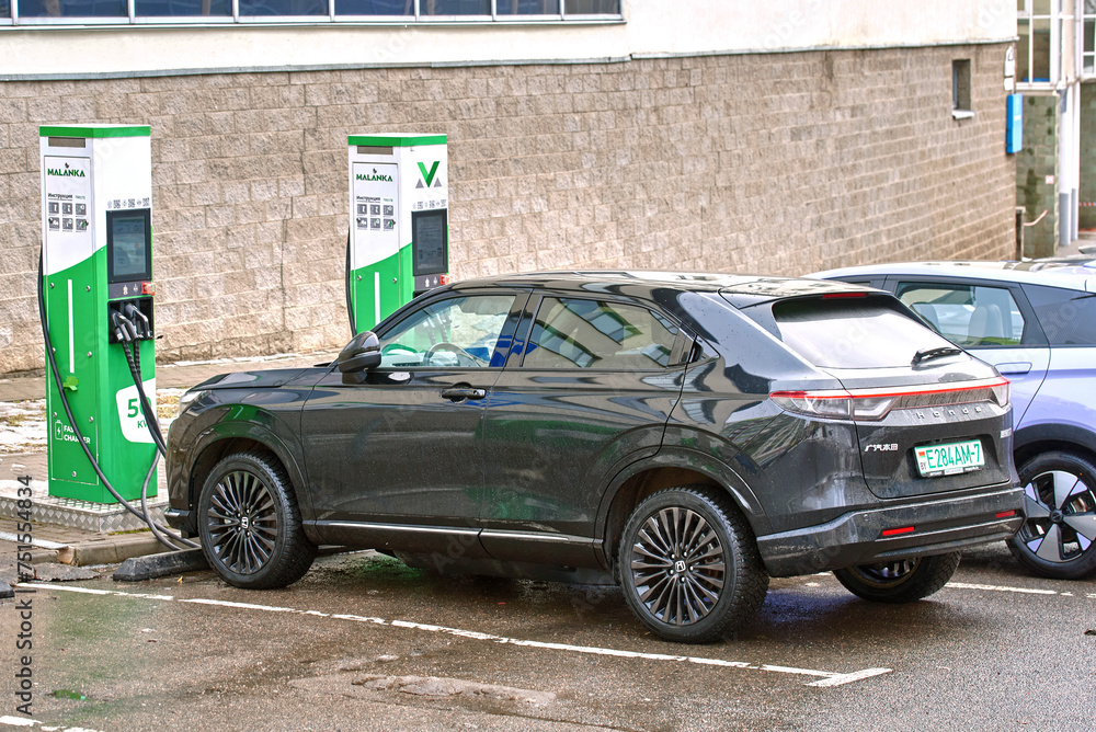 Minsk, Belarus. Feb 3.2024. Honda e:NP1 electirc car charge battery on ...
