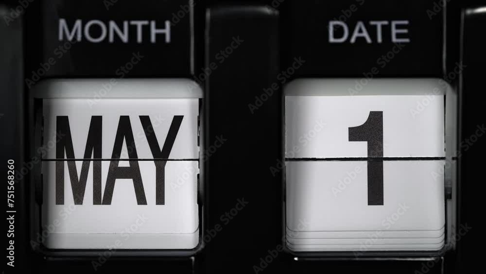 retro flip calendar with a date change from the thirtieth of April to ...