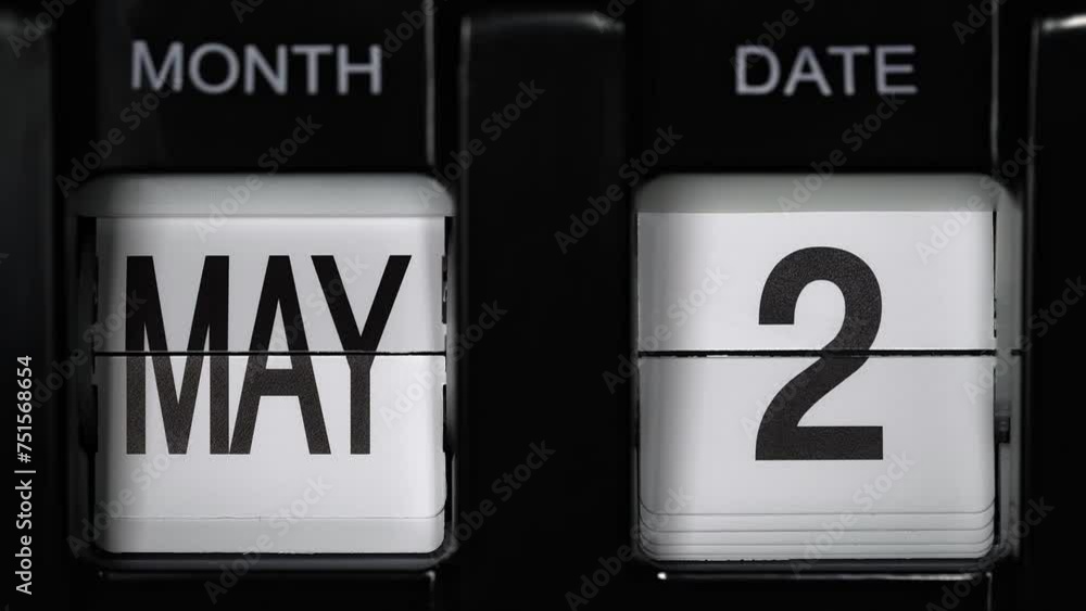retro flip calendar with a date change from the first of May to the ...