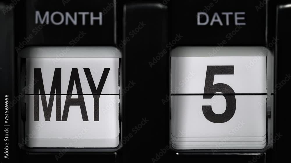 retro flip calendar with a date change from the fourth of May to the ...