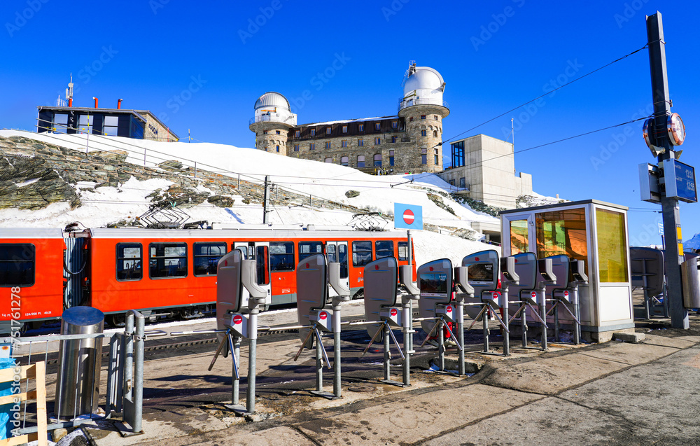 Turnstiles on the platform of the Gornergrat Railway overlooked by the ...