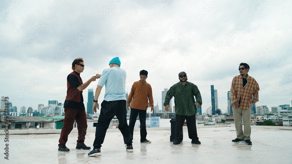 Professional break dance team practice B-boy dance while multicultural ...