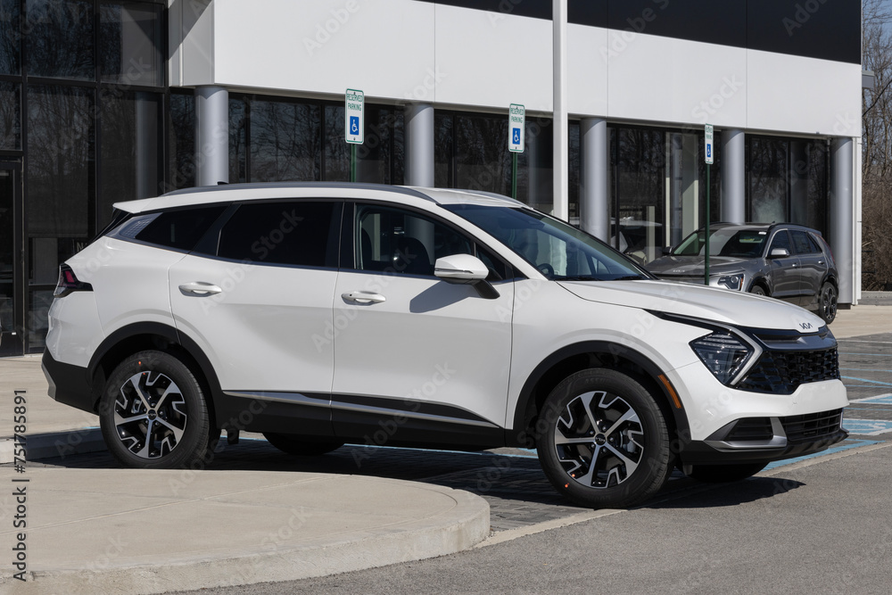 Kia Sportage HEV Hybrid EV display at a dealership. Kia offers the ...