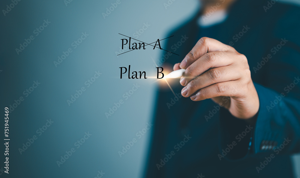Business plan strategy changing.The man crossing over Plan A, writing ...