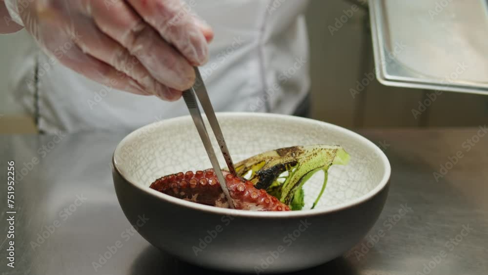 Chef cooking grilled octopus, japanese cuisine, man grill seafood with ...