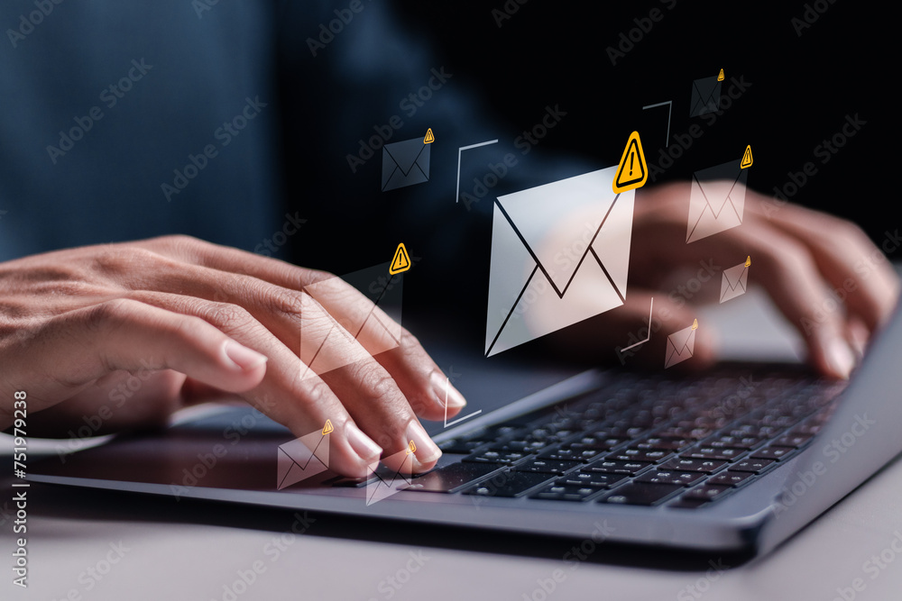 Email Spam concept. warning notification and spam message. Person using ...