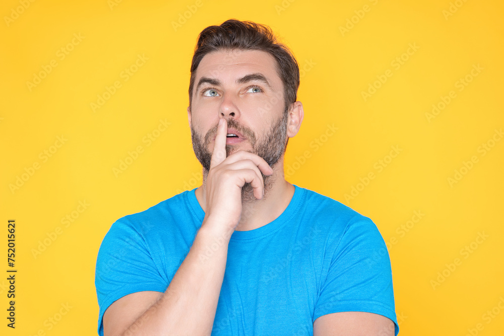 Portrait of thoughtful guy making choice. Handsome man thinking on ...