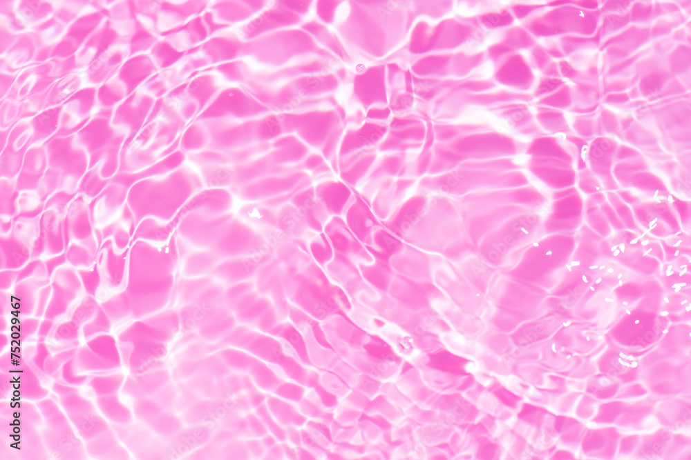 Water surface. Pink water waves on the surface ripples blurred ...