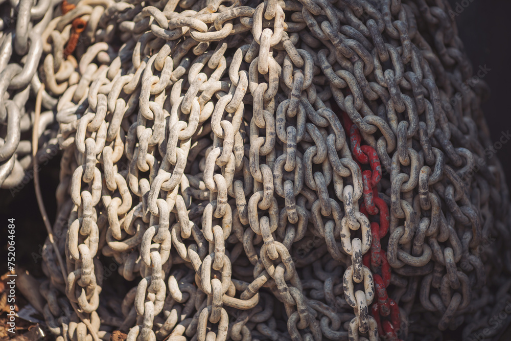 Iron chains piled in a pile. pile of heavy metal chain, marine anchor ...