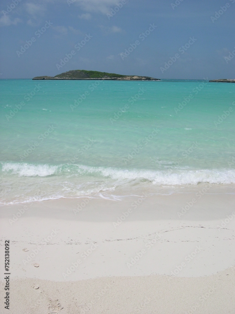 Turquoise sea water and blue sky in Tropic of Cancer Beach, Little ...