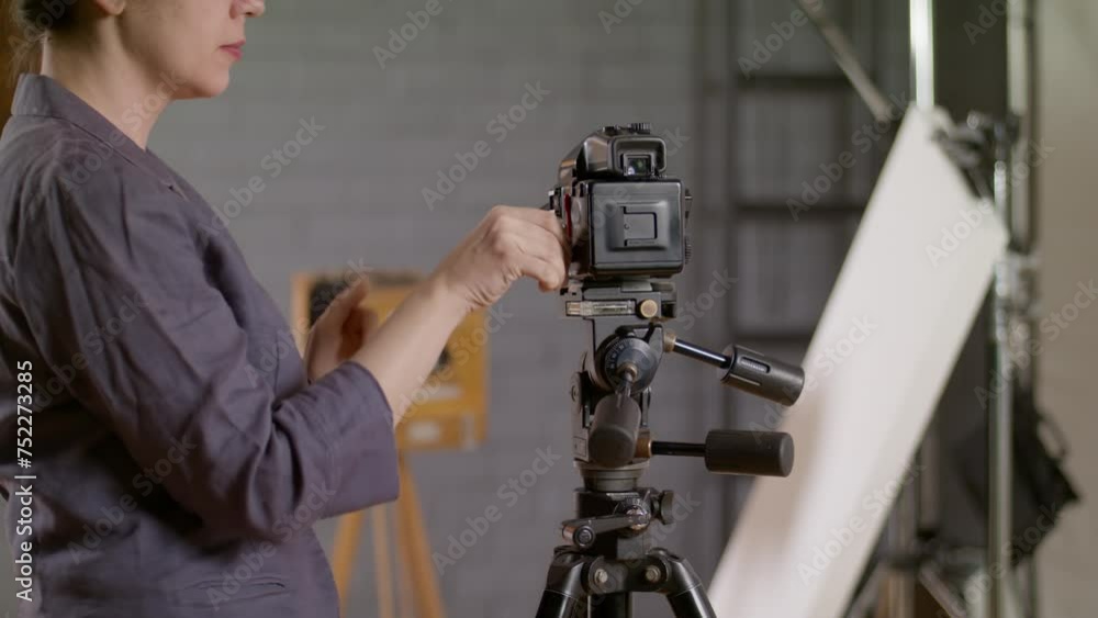 Load the film into the cassette and rearrange the dark slide shading ...