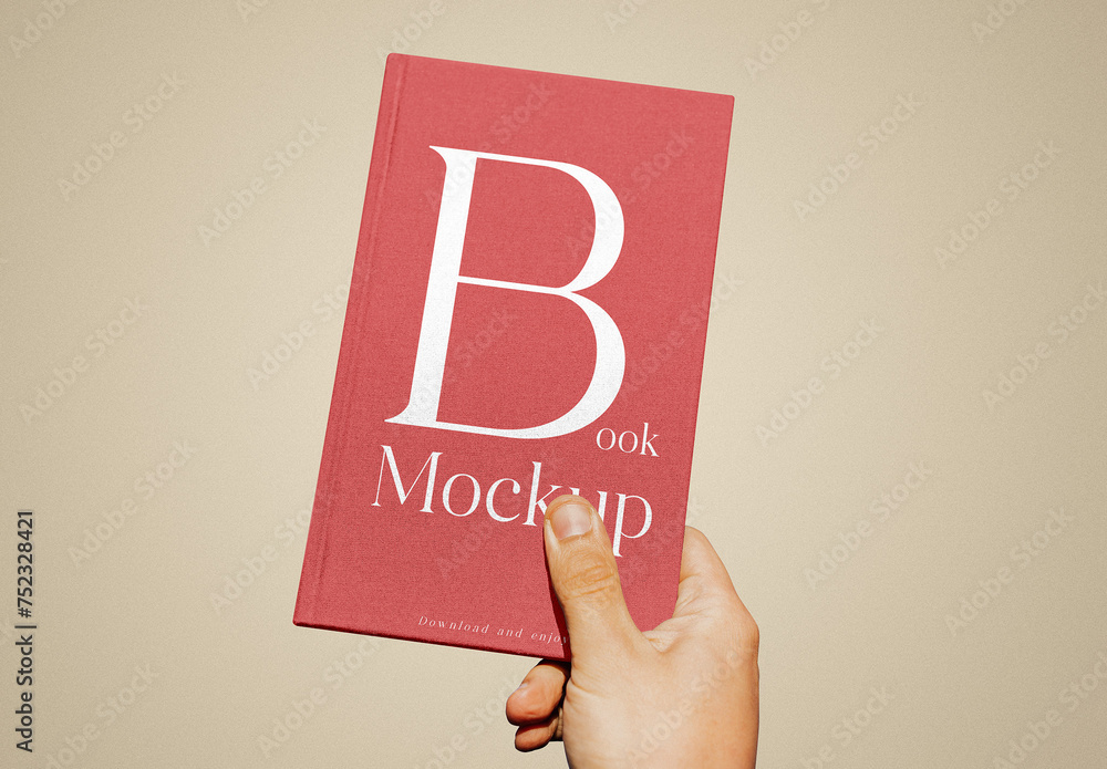 Book Cover in Hand Mockup Stock Template | Adobe Stock
