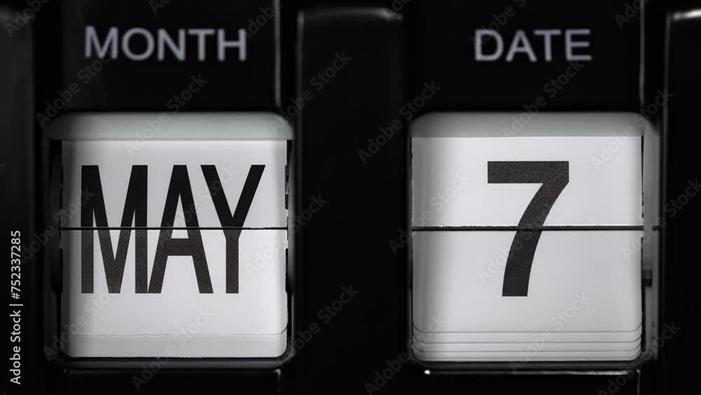 retro flip calendar with a date change from the sixth of May to the ...