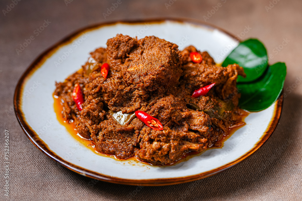 Rendang Pork. Rendang is an Indonesian West Sumatra Minangkabau spicy ...
