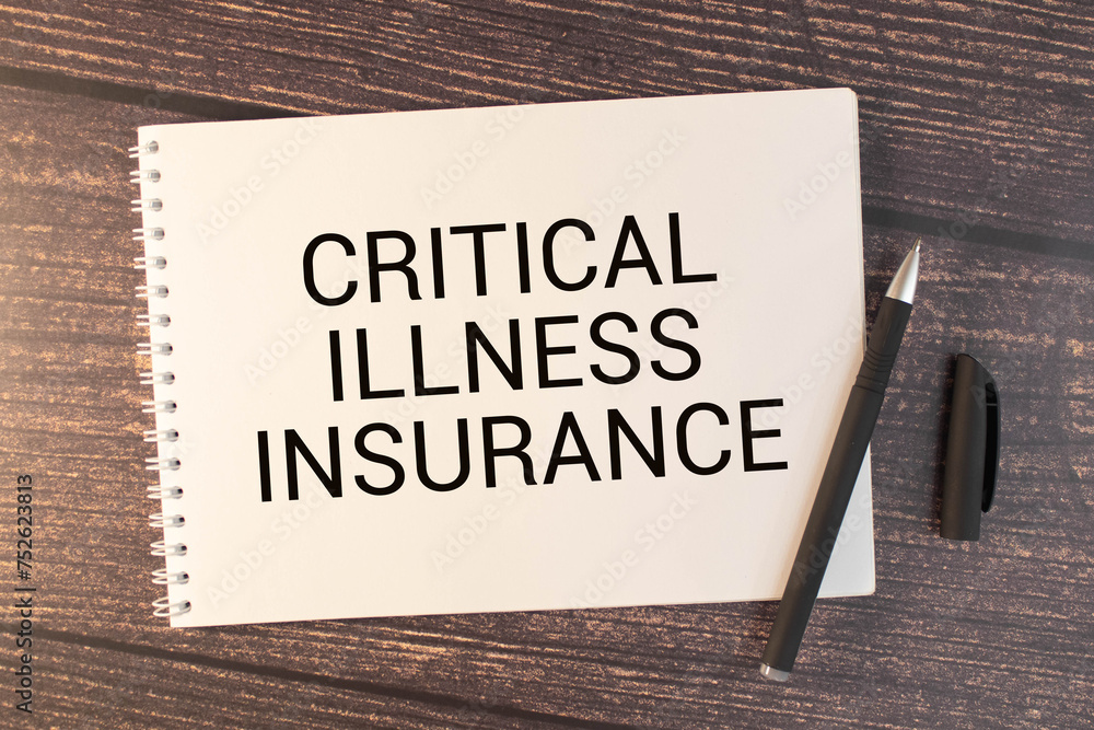 Notepad with text CRITICAL ILLNESS INSURANCE. Diagram and white ...