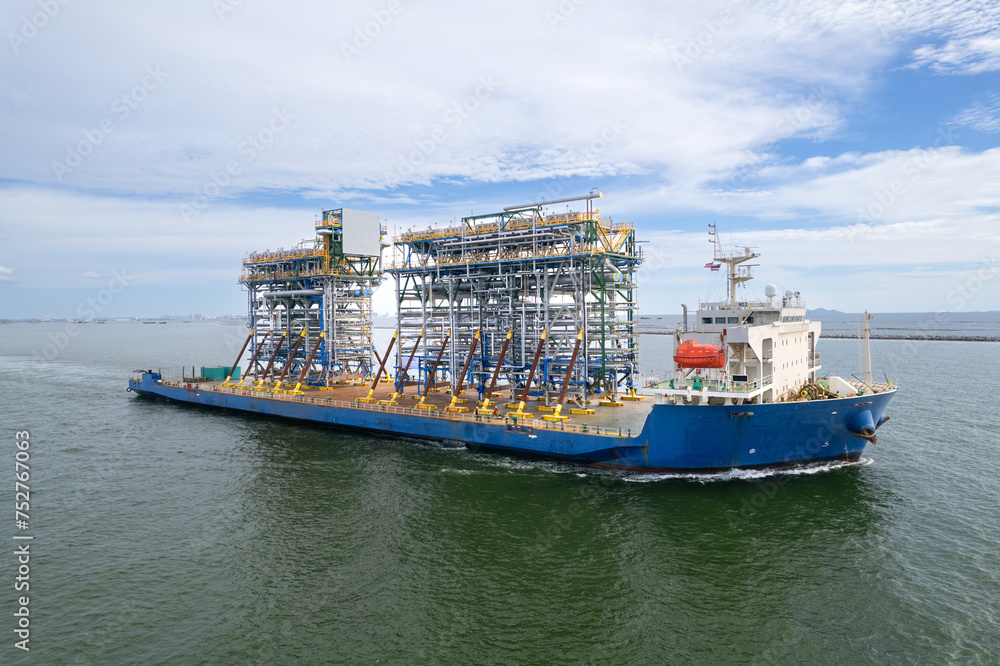 Top view Logistics and transportation large cargo ship Transporting ...