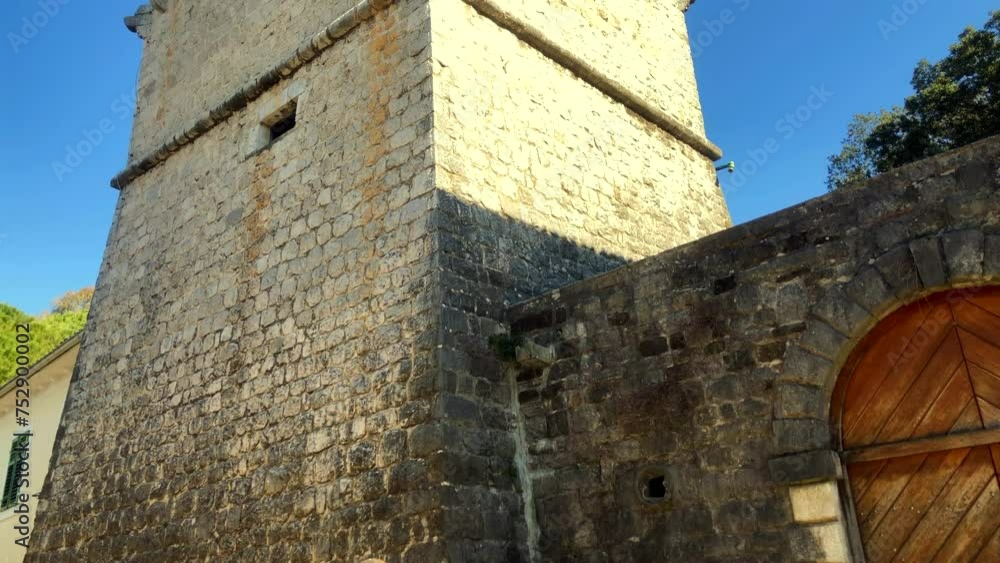 Stone fort tower. Castle gate and defensive tower. Bucha Palace ...