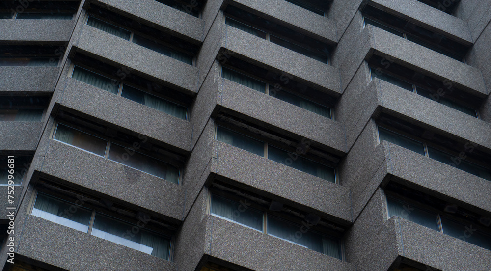 Exterior building wall of abstract concrete geometric pattern, an ...