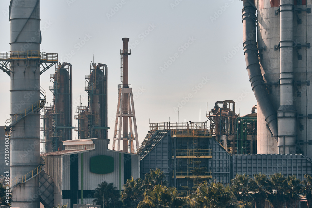 Oil and gas industrial area. Structures of refinery plant. Metal ...